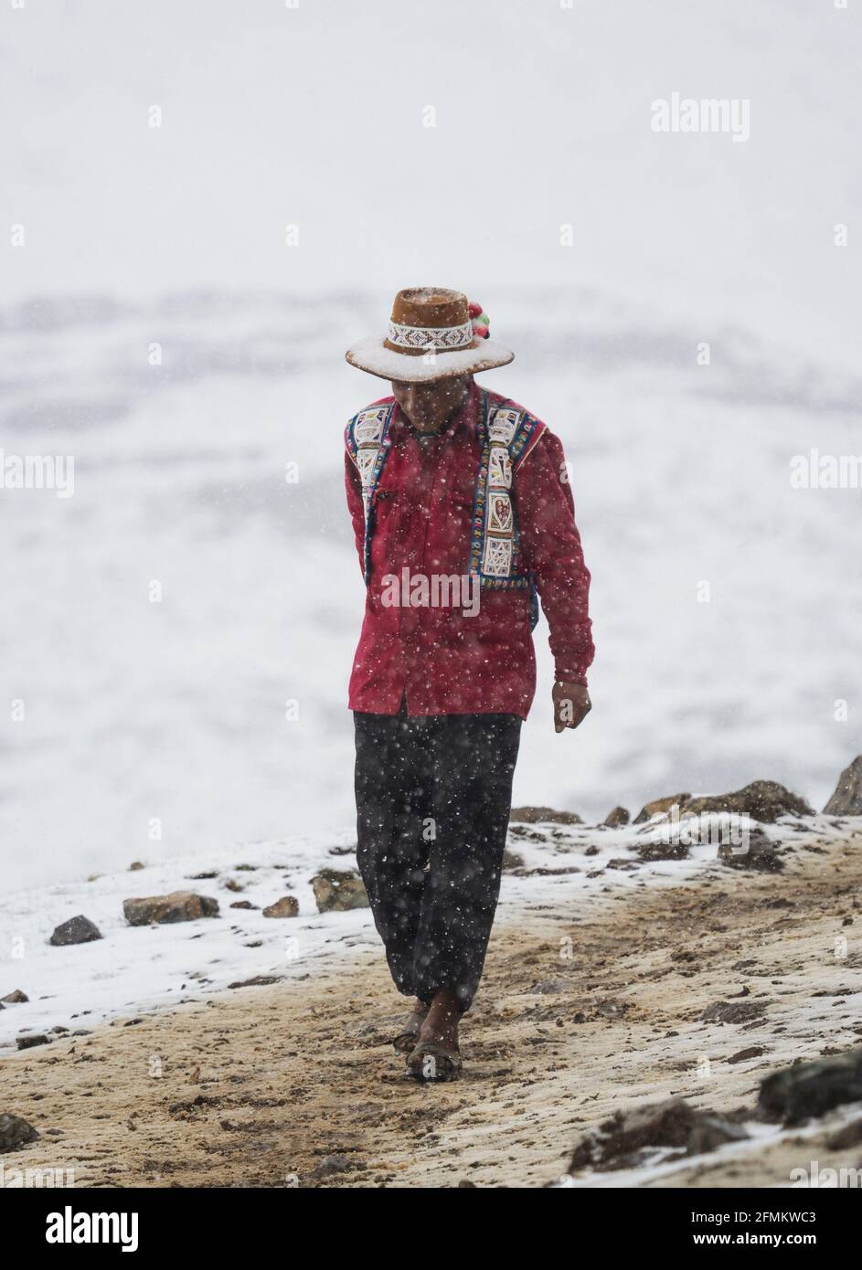 Local indigenous people in traditional colourful andean clothes at ...