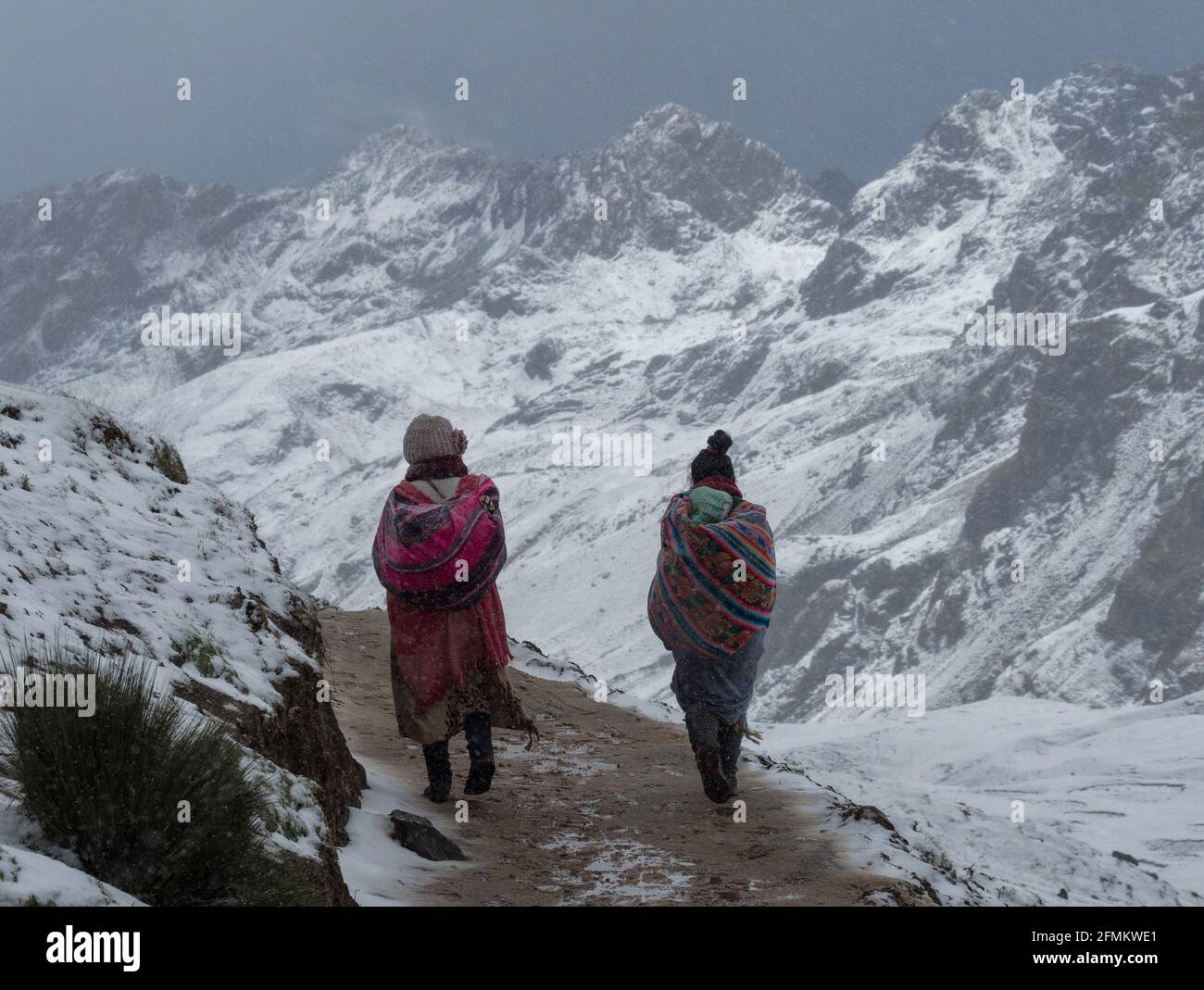 Local indigenous people in traditional colourful andean clothes at ...