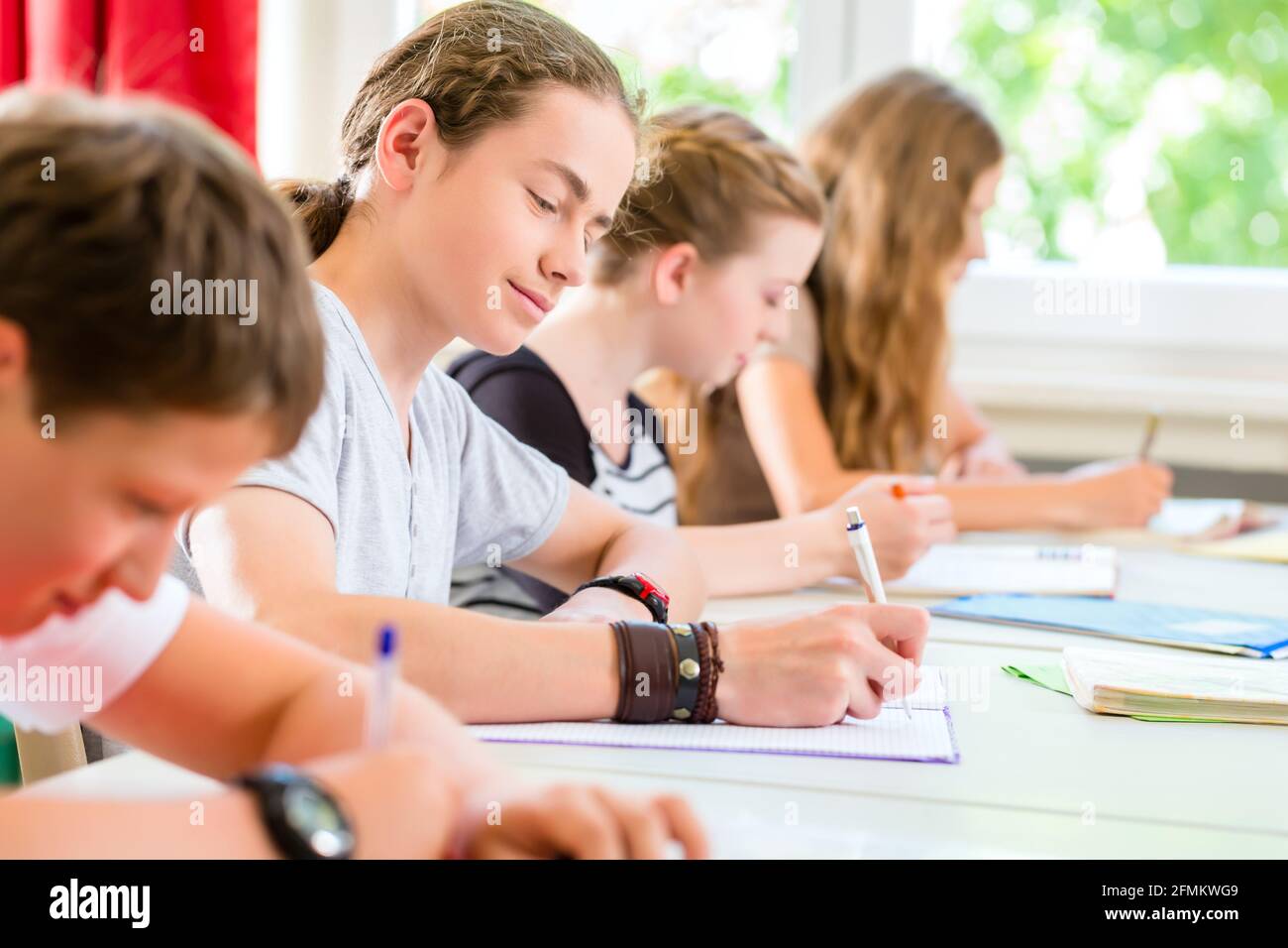 School girls examination classroom hi-res stock photography and images ...