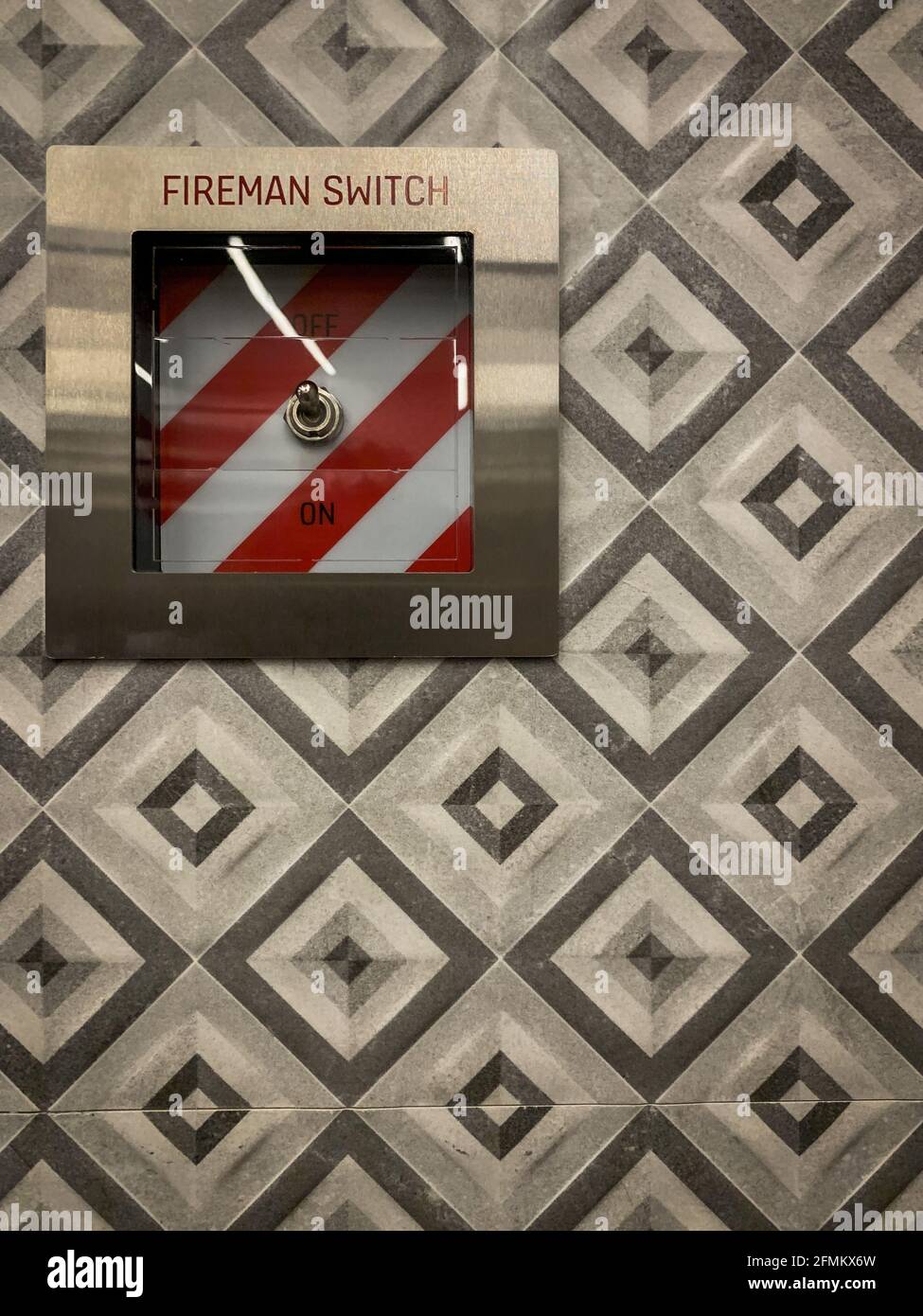 Fireman switch on the wall inside a building Stock Photo - Alamy