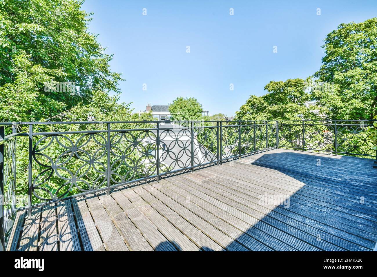Empty wooden terrace of modern house Stock Photo - Alamy