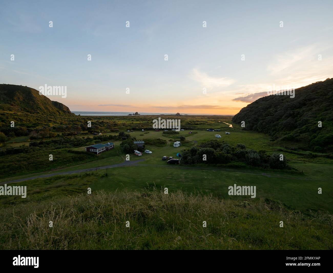 Landscape nature sunset panorama at idyllic remote Whatipu beach ...