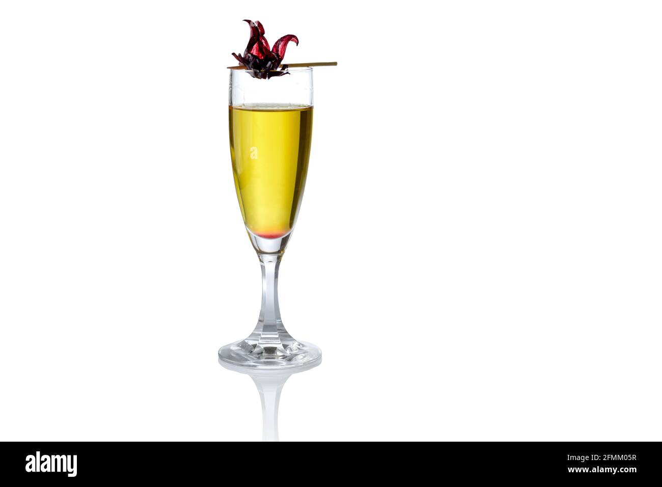 Yellow alcoholic cocktail in glass flute isolated on white, copy space ...