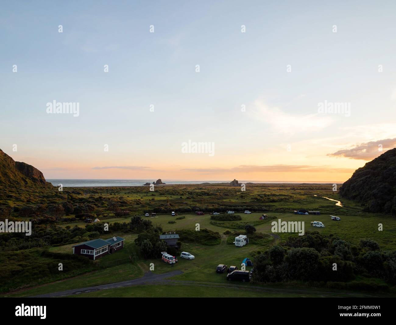 Landscape nature sunset panorama at idyllic remote Whatipu beach ...