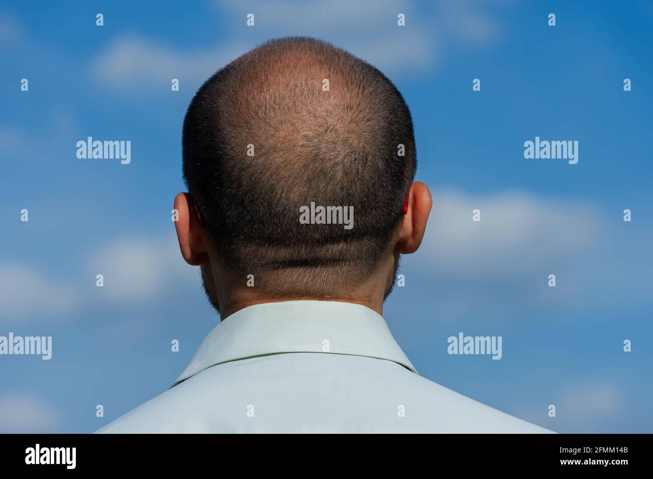 Back male head neck suit hi-res stock photography and images - Alamy