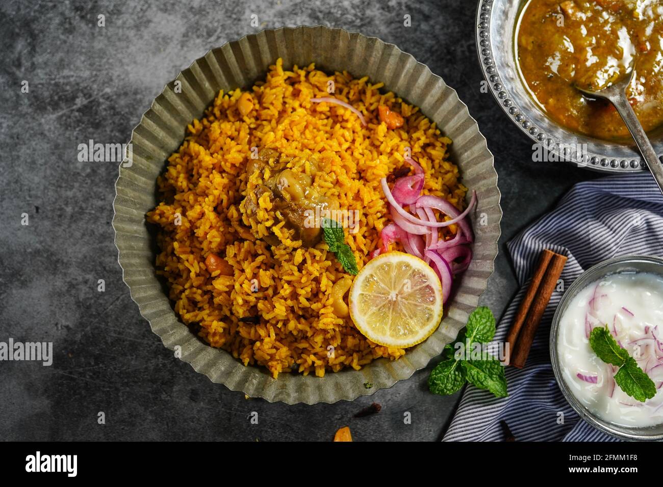 Irachi / Erachi choru chicken - Malabar meat rice served with raita and ...