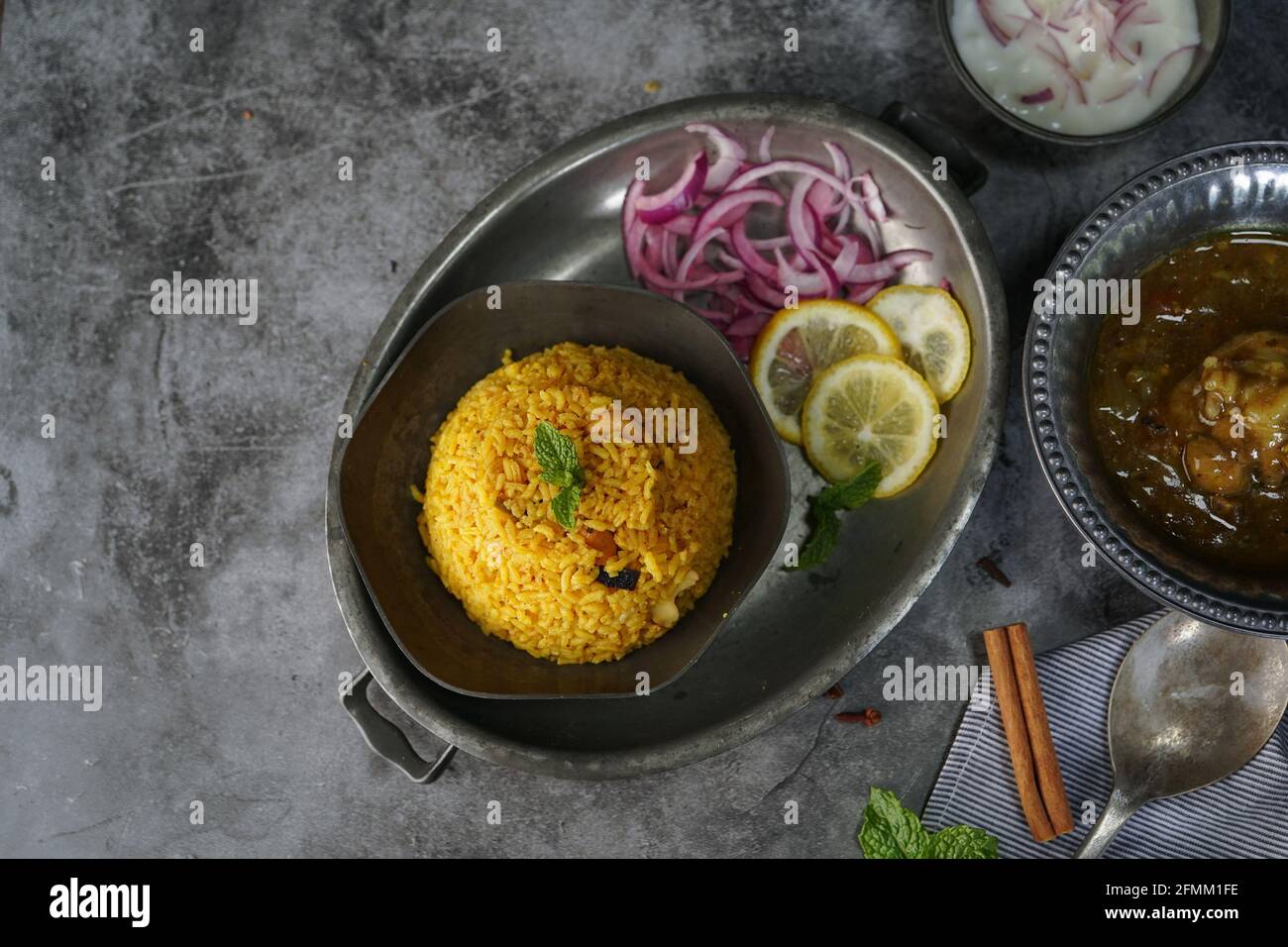 Irachi / Erachi choru chicken - Malabar meat rice served with raita and ...