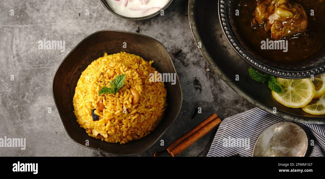 Irachi / Erachi choru chicken - Malabar meat rice served with raita and ...