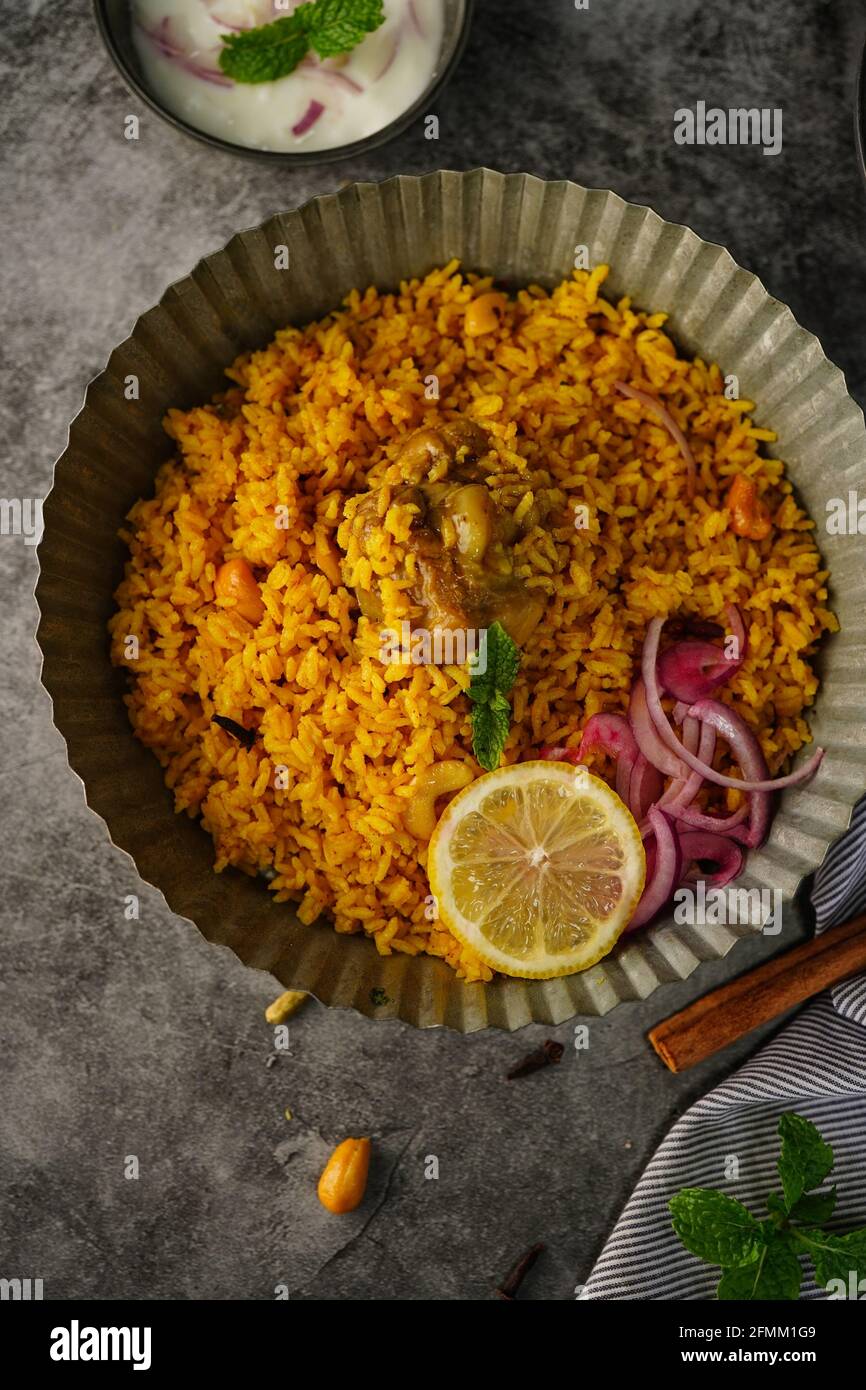 Irachi / Erachi choru chicken - Malabar meat rice served with raita and ...