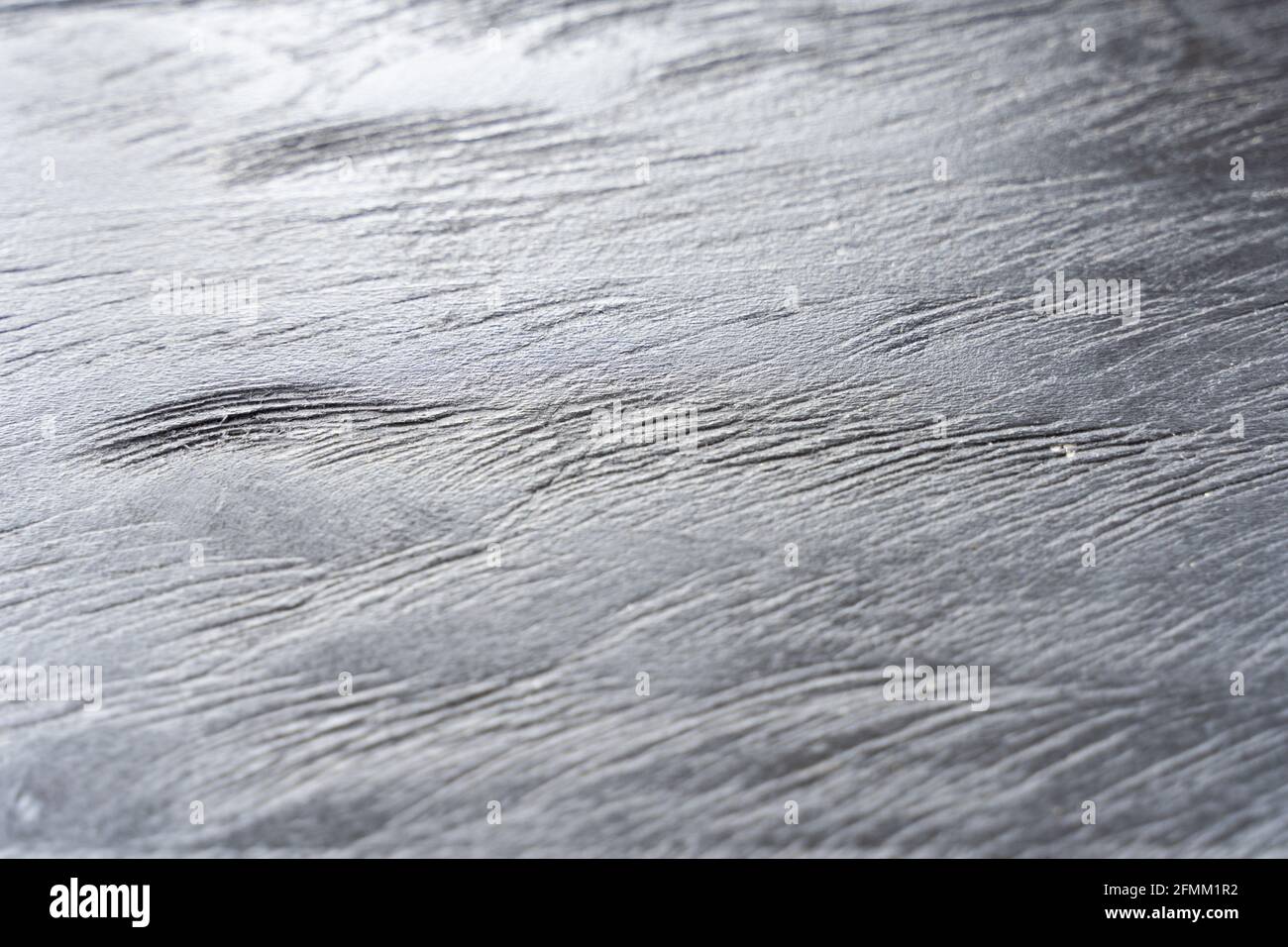 Natural light on grey wood plank. Gray background texture of home table ...