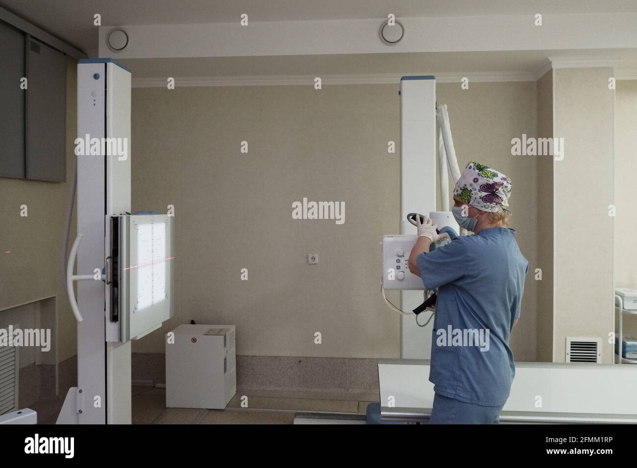 The work of a radiologist in the X-ray room for diagnostics Stock Photo ...