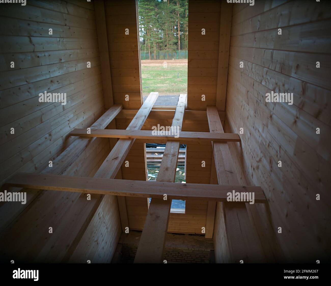 Timber floor lags in unfinished house, view from inside Stock Photo - Alamy