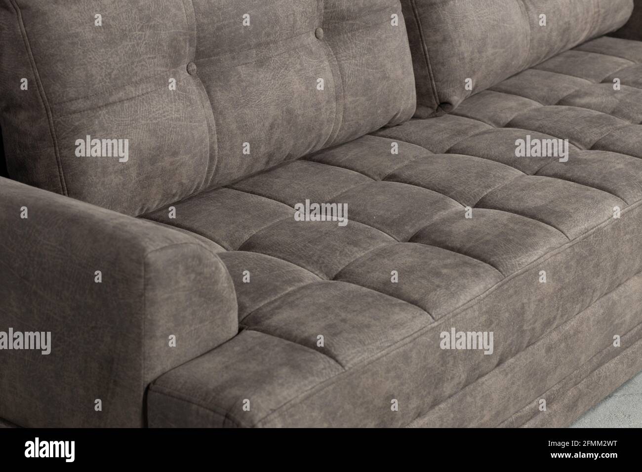 Stylish brown sectional couch for a modern living room interior Stock ...