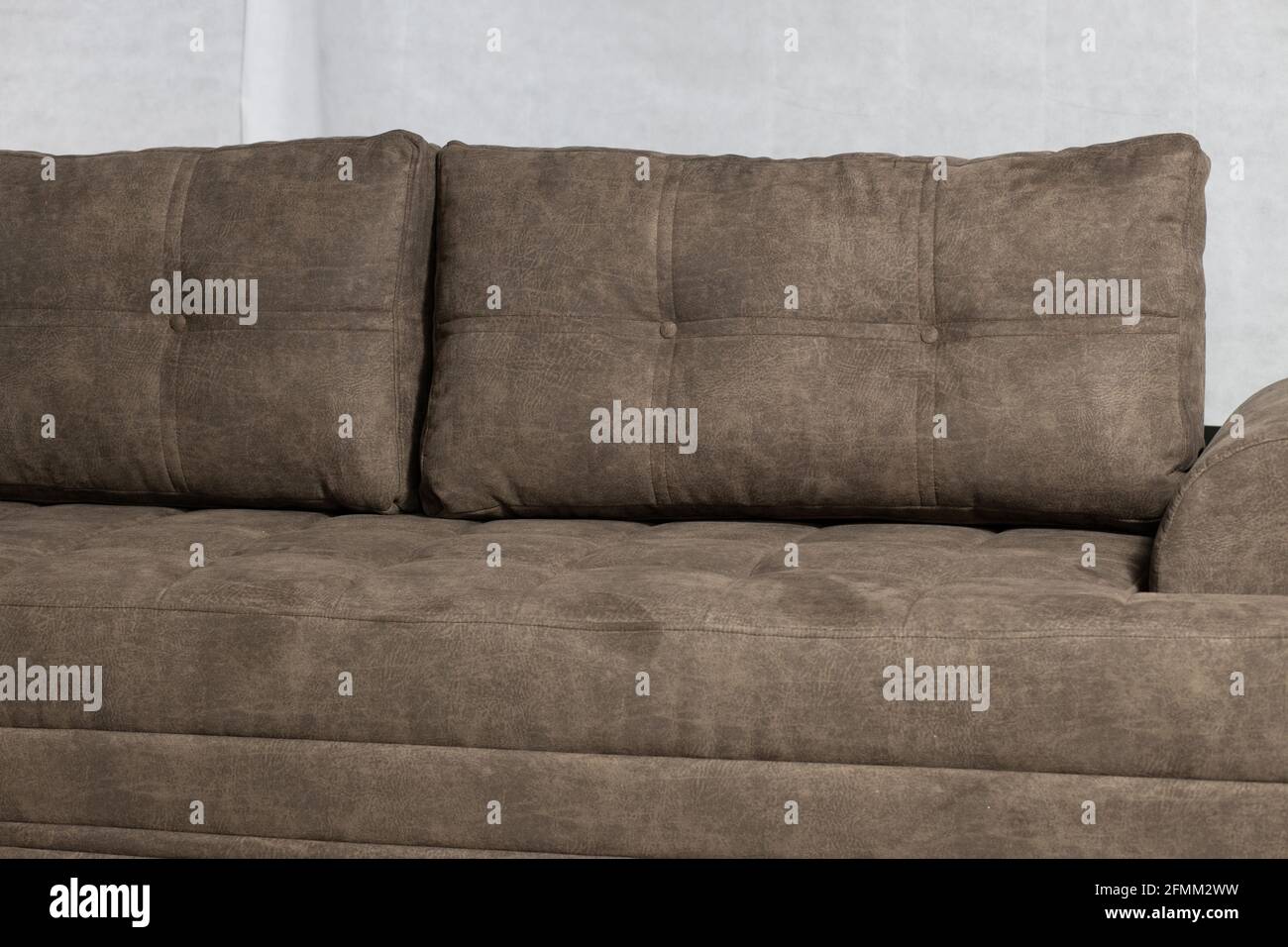 Stylish brown sectional couch for a modern living room interior Stock ...