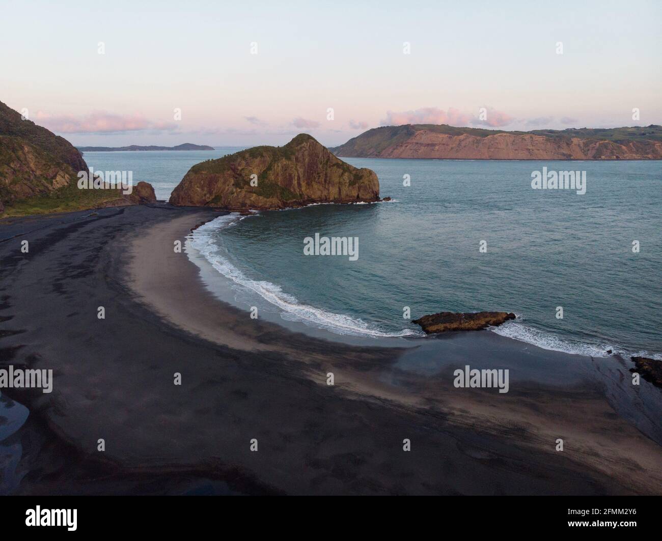 Aerial nature landscape sunset panorama of idyllic remote black sand ...