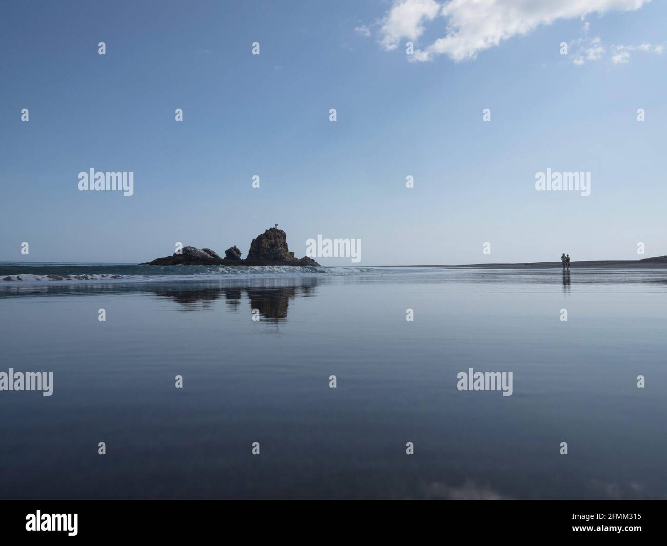 Low tide water pond lake structures pattern landscape on black sand ...