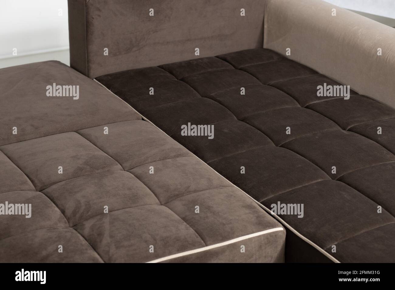 Stylish brown sectional couch for a modern living room interior Stock ...