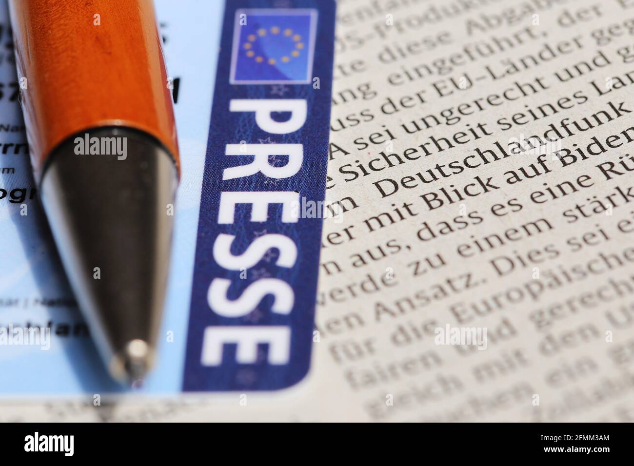 Press card, ballpoint and newspaper article as a symbol for the press ...
