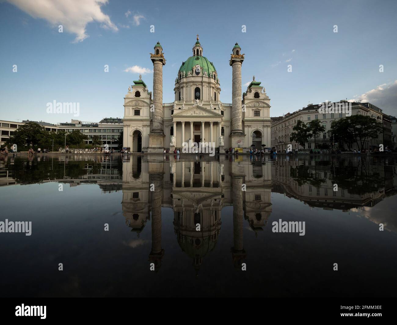 Water fountain pond mirror reflection panorama of old historic roman ...
