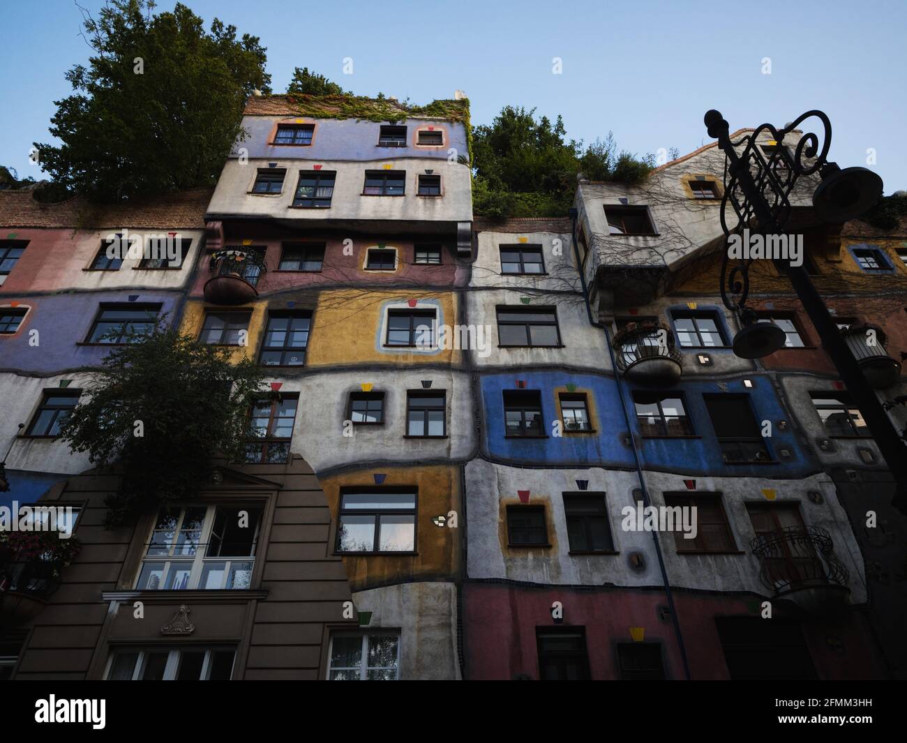 Exterior facade panorama of expressionist architecture colourful house ...