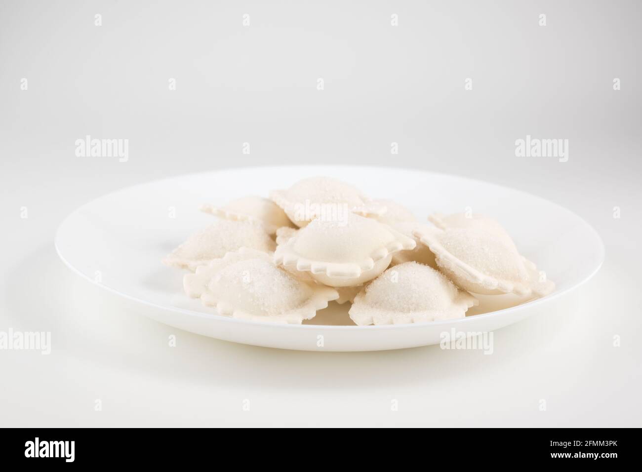 frozen dumpling covered with frost isolated on white background Stock ...