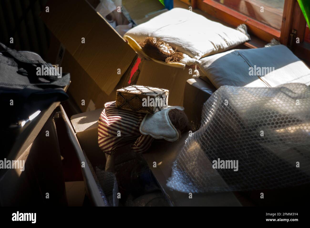 Pile of various household stuff in a messy room, shallow dof Stock ...
