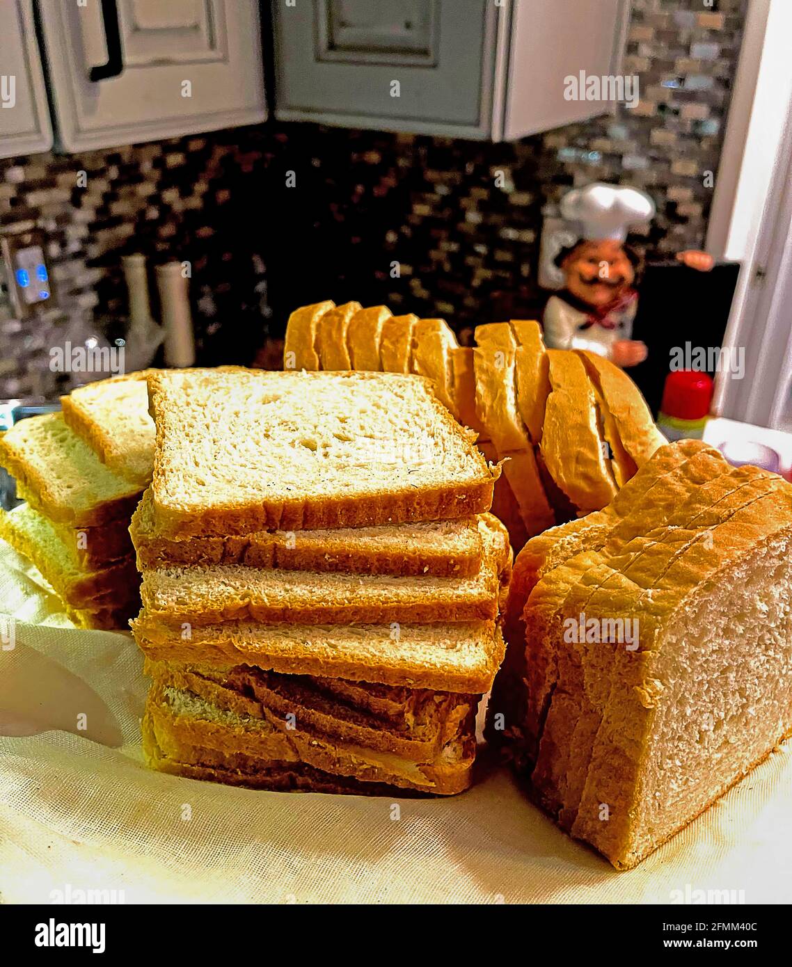 Homemade bread sliced and ready to serve in home Stock Photo - Alamy