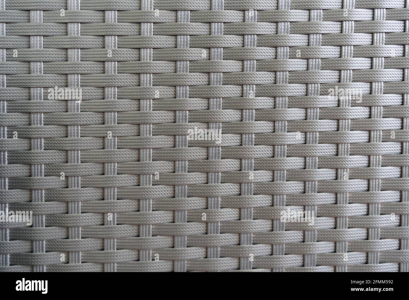 Synthetic grey rattan close up. Gray background texture Stock Photo - Alamy