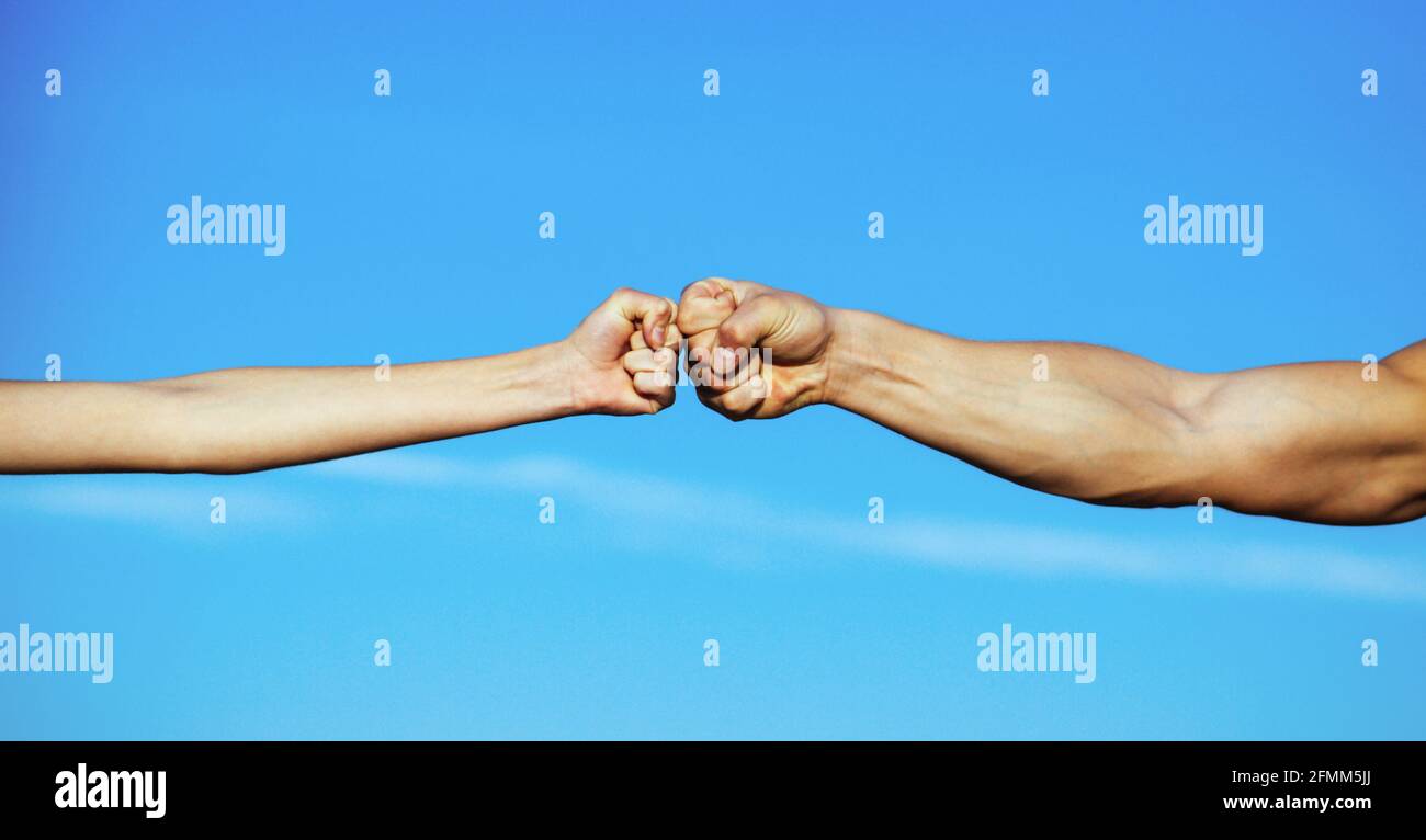 Fist Bump. Clash of two fists, vs. Concept of confrontation ...