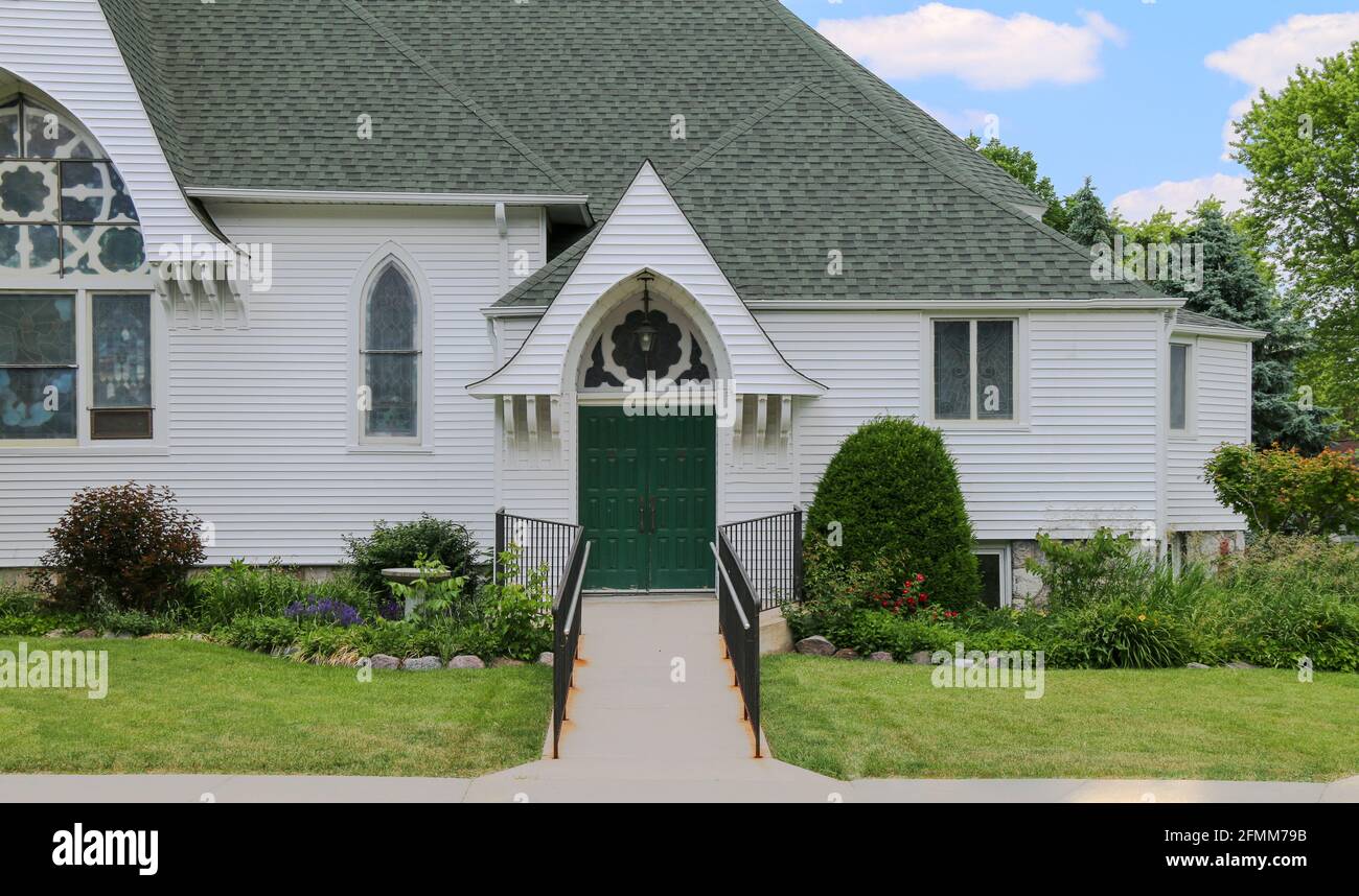 unique style architecture vintage church facade with green door shot as ...