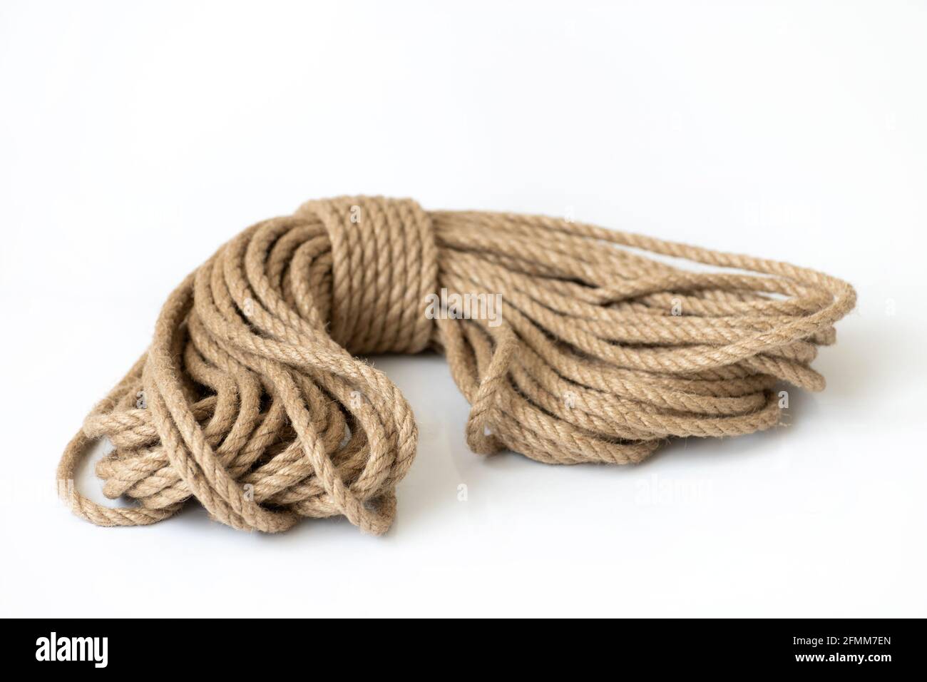 natural jute rope isolated on a white background Stock Photo - Alamy