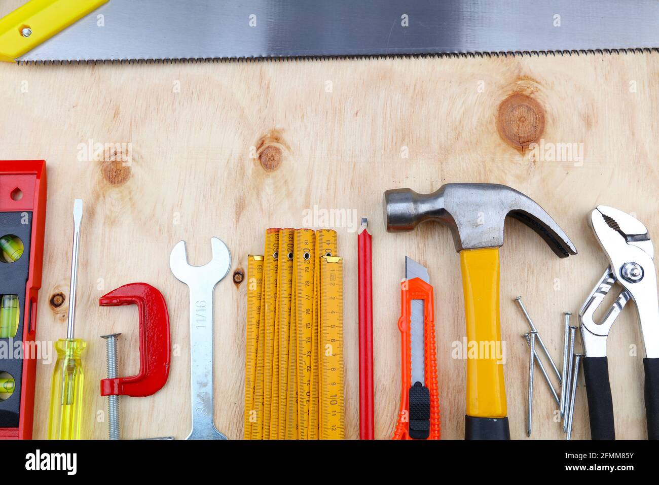 Assorted work tools on wood Stock Photo - Alamy