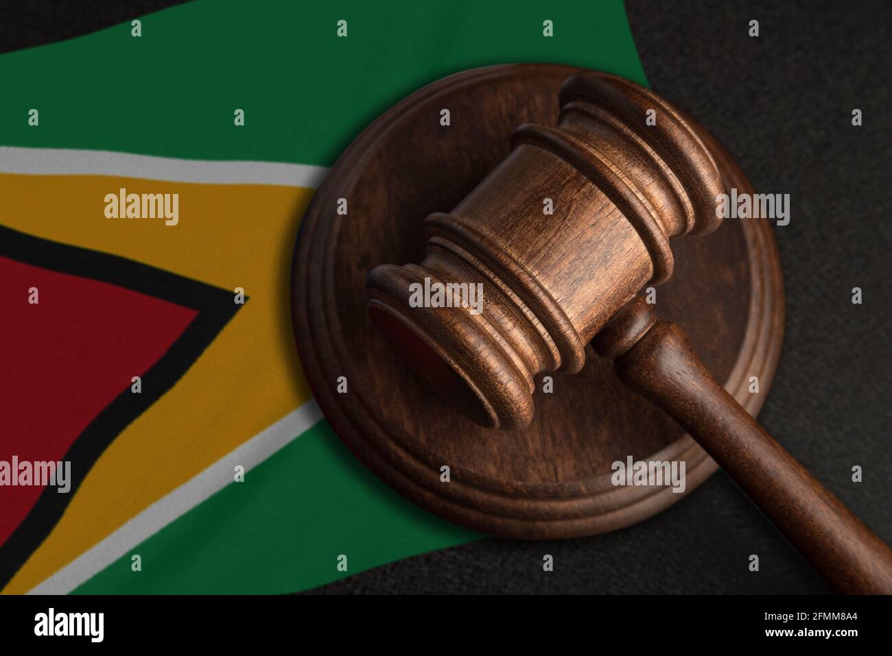Judge gavel and flag of Guyana. Law and justice in Guyana. Violation of ...