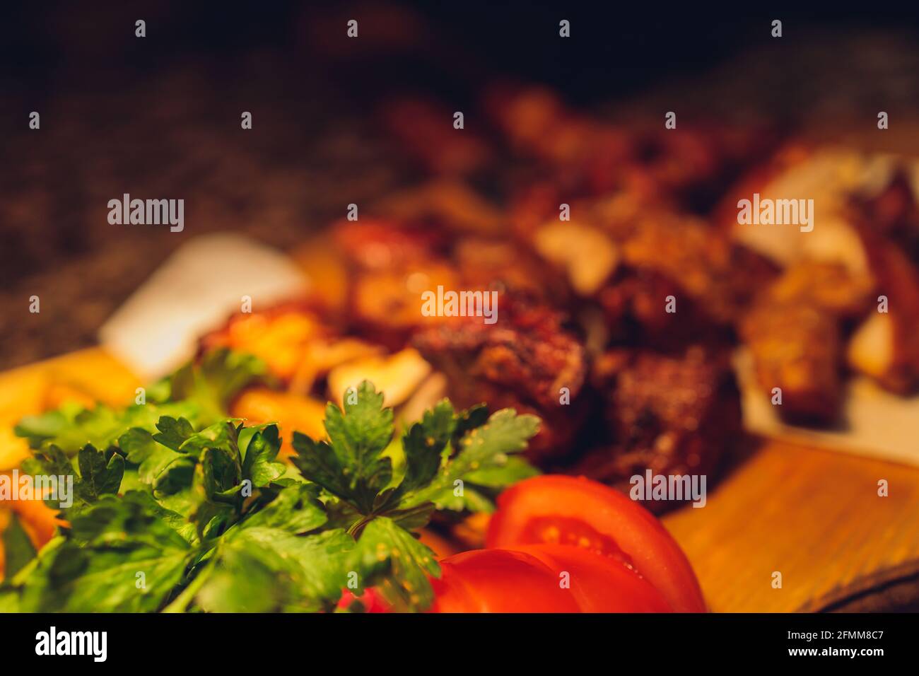 traditional Georgian lula kebab with three types sauce - ketchup, green ...