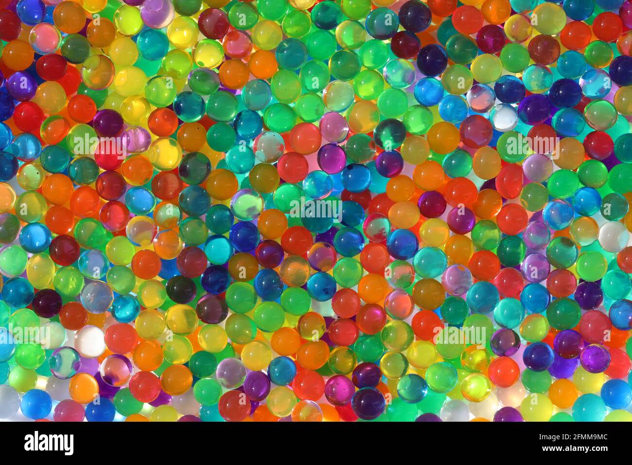 Abstract background with colorful hydrogel balls Stock Photo - Alamy
