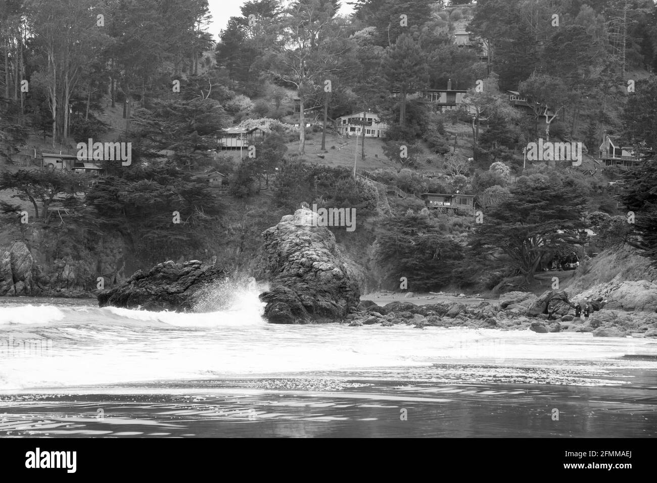 Sea waves crashing on rock Black and White Stock Photos & Images - Alamy