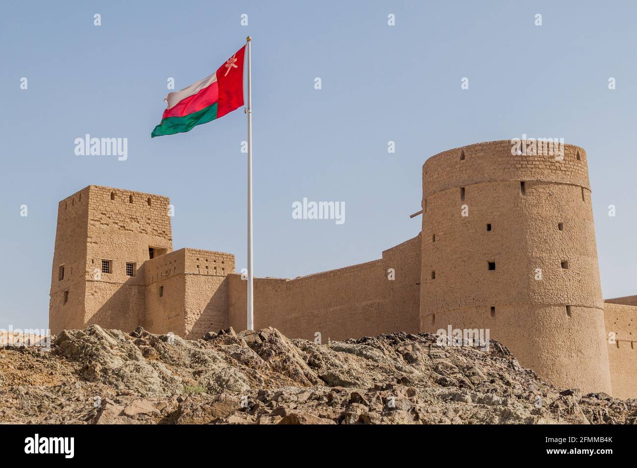 Omani flag at Bahla Fort, Oman Stock Photo - Alamy