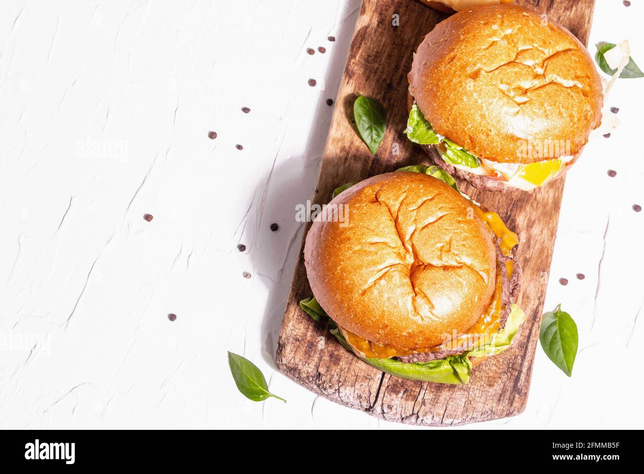 Fresh burgers, American fast food. Assorted of three pieces, modern ...