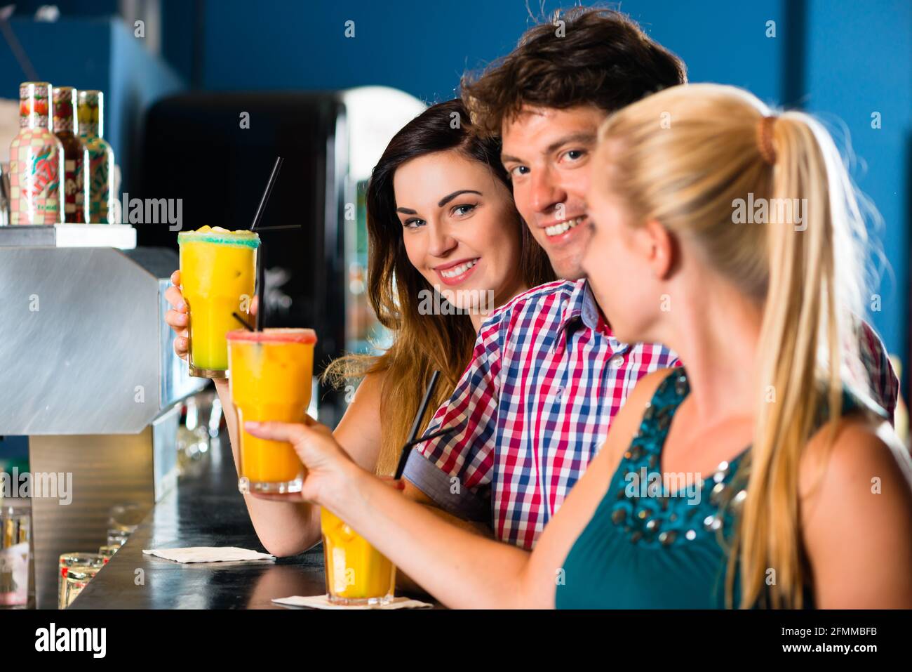 Girls drinking cocktails in bar hi-res stock photography and images - Alamy