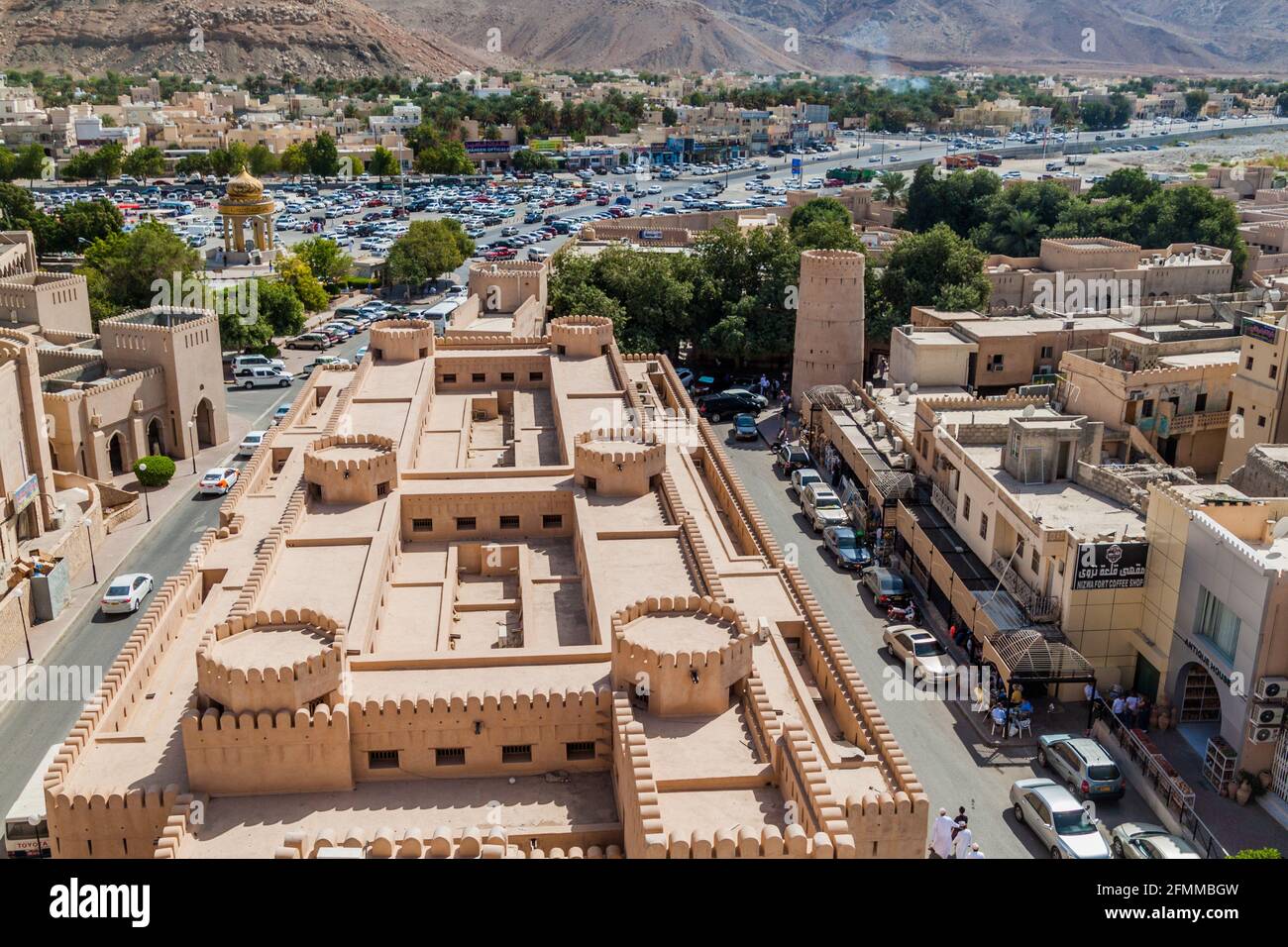NIZWA, OMAN - MARCH 3, 2017: Aerial view of Nizwa, Oman. Parking lot ...