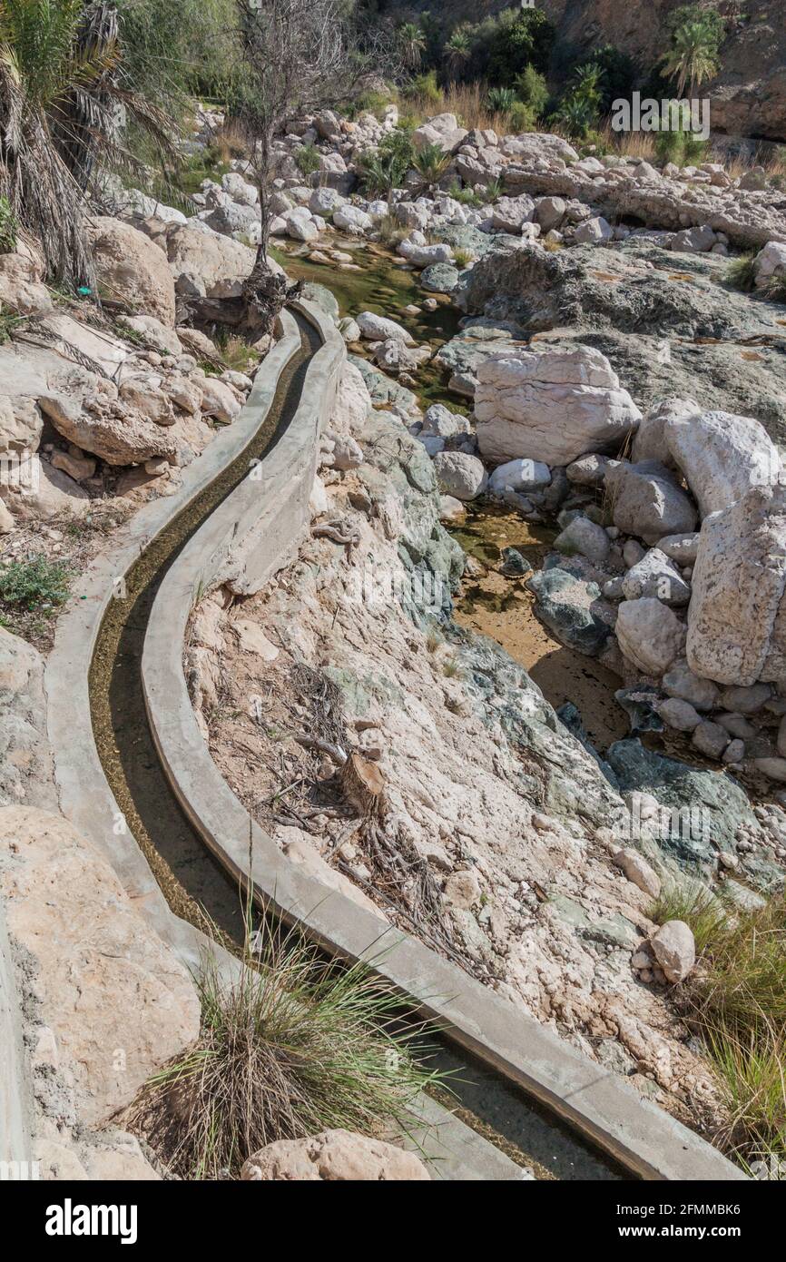 Falaj water channel in Wadi Tiwi valley, Oman Stock Photo - Alamy