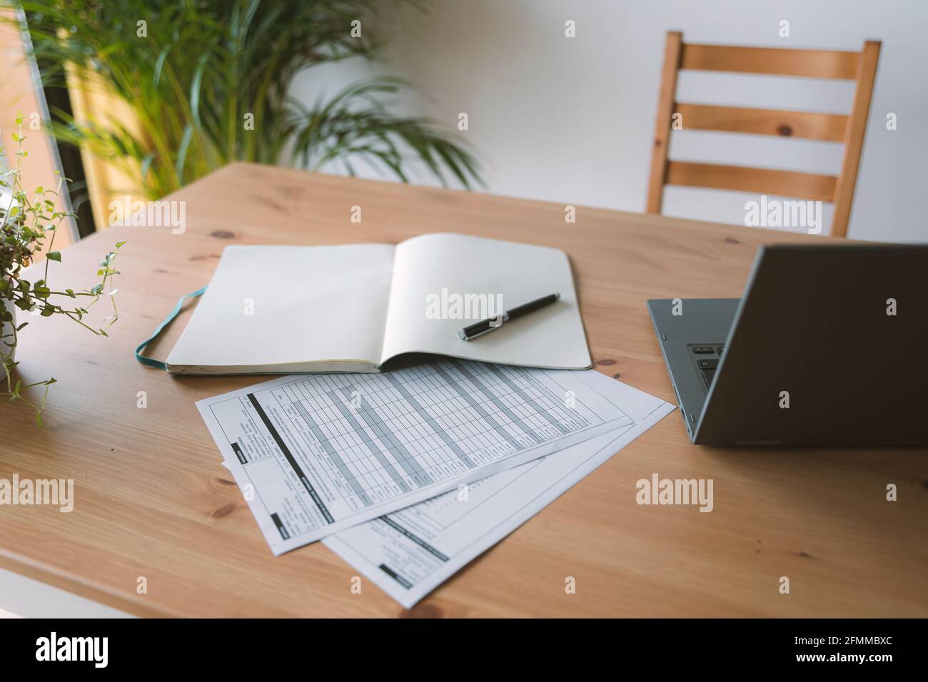 Closeup shot of a wooden office desk with business supplies Stock Photo ...
