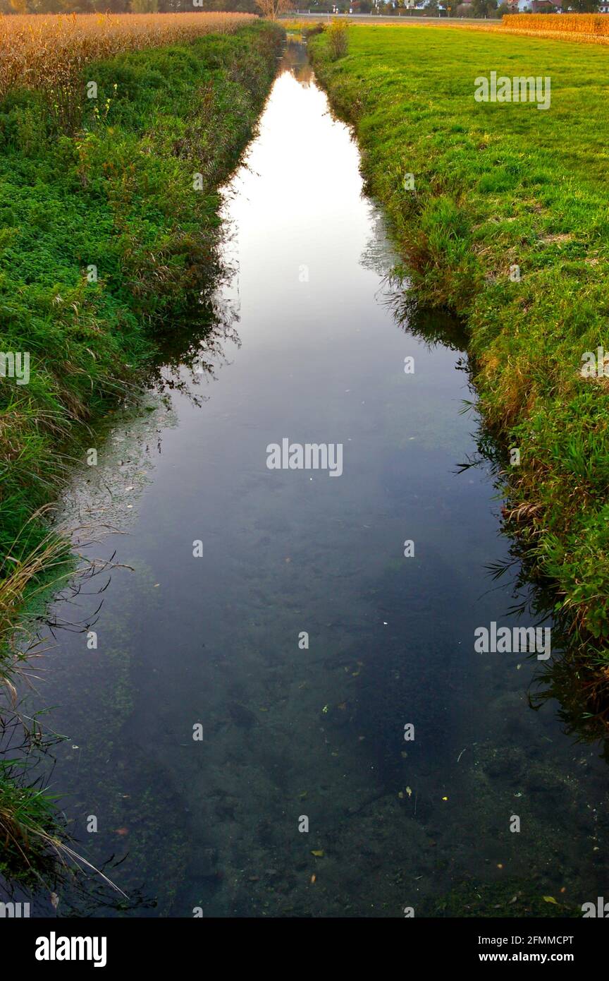 Green field river running through hi-res stock photography and images ...