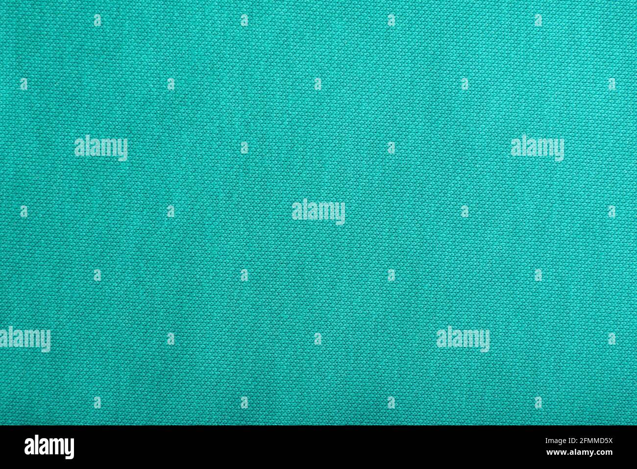 Green homogeneous cotton background. Textile surface. Cloth Stock Photo ...
