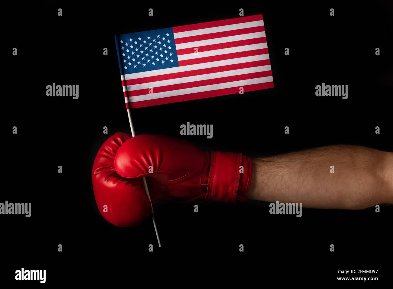 Boxers hand holds USA flag. Boxing glove with the flag of United States ...