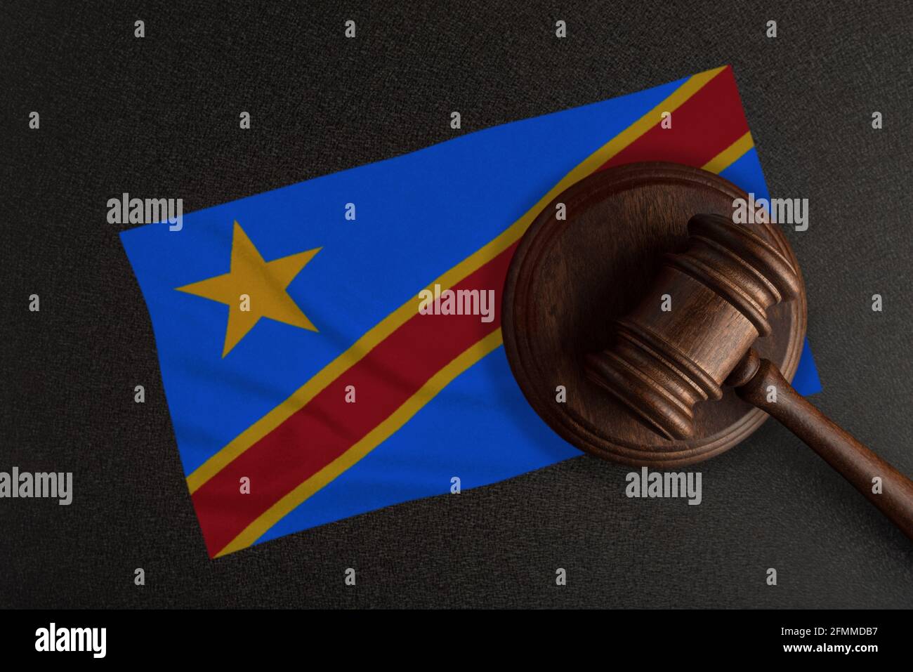 Judges gavel and the flag of Democratic Republic of the Congo. Law and ...