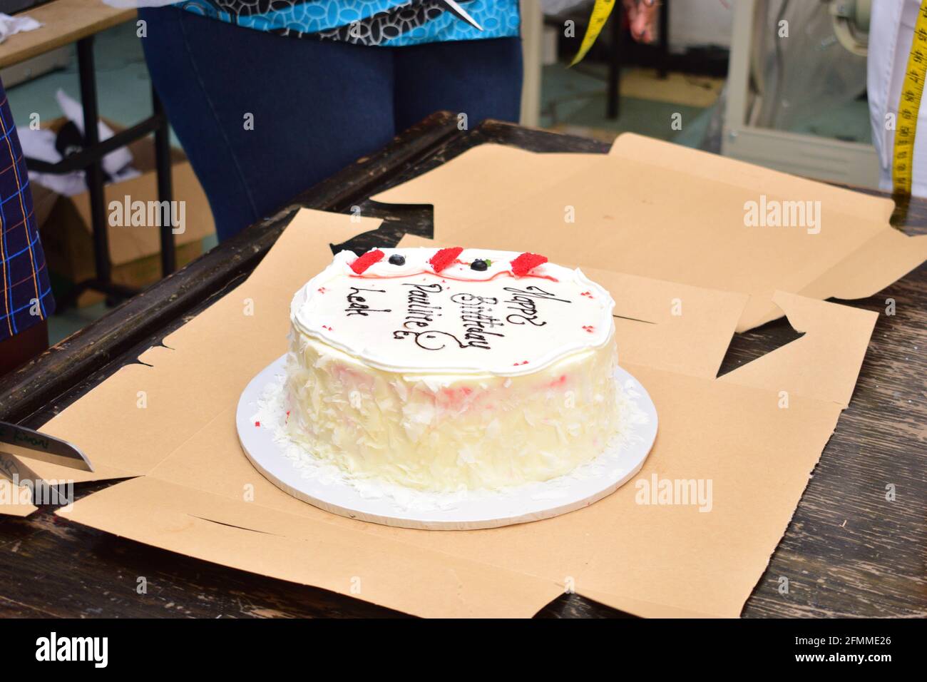 birthday cake measured with a measuring tape Stock Photo - Alamy