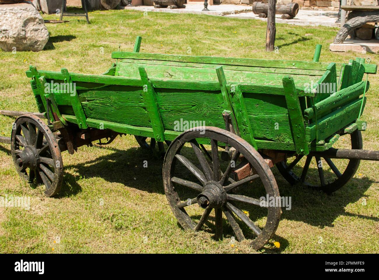 Old green wooden rural cart closeup in village house garden Stock Photo ...