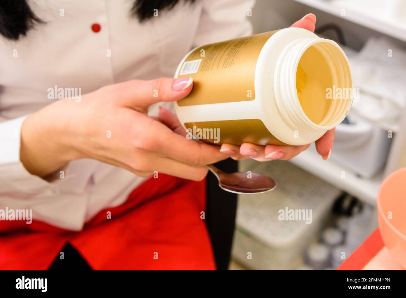Preparation of a golden mask, a procedure at a beautician, facial care ...