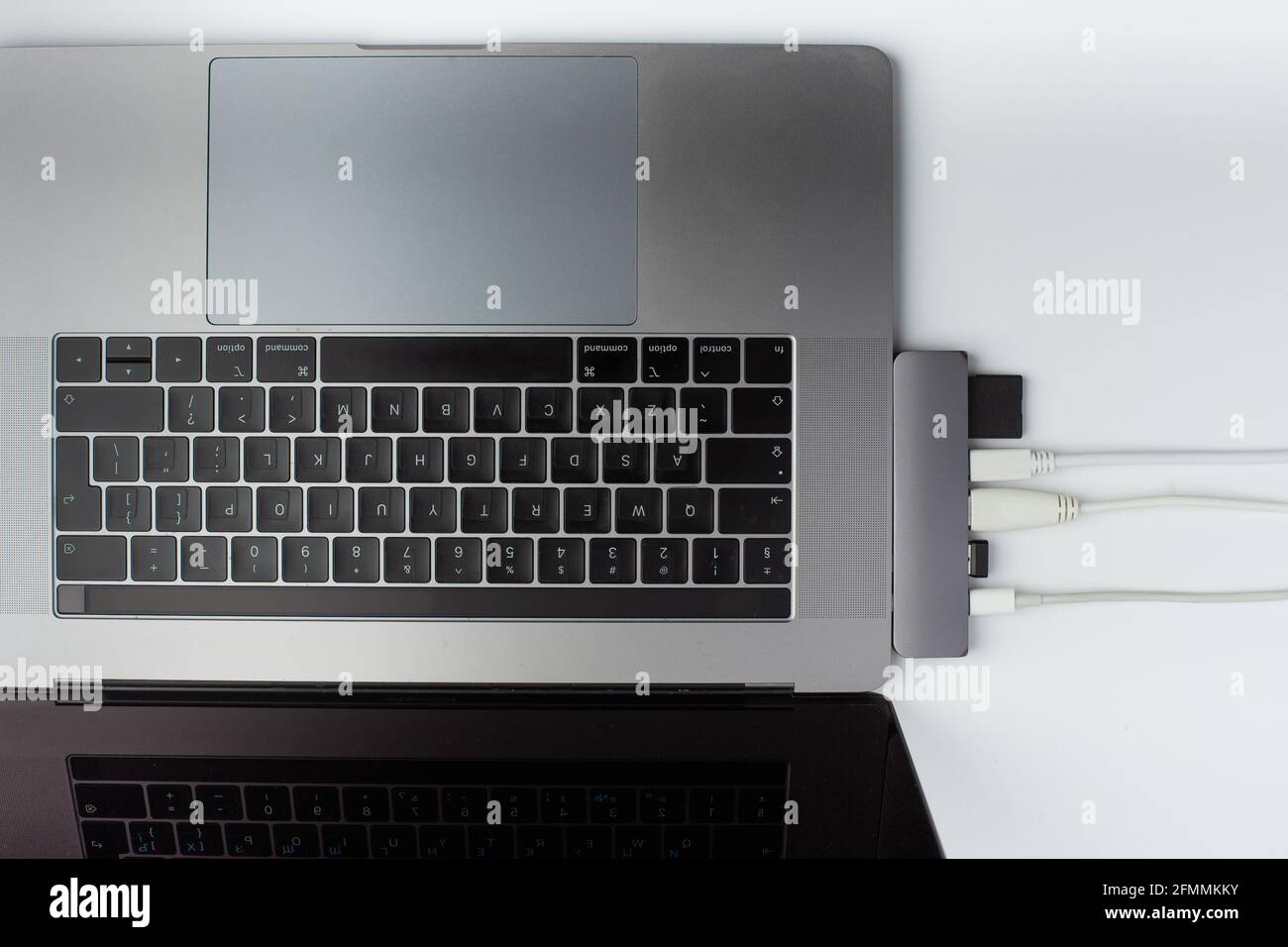 Close-up photo of type-c hub with cables and black card connected to ...